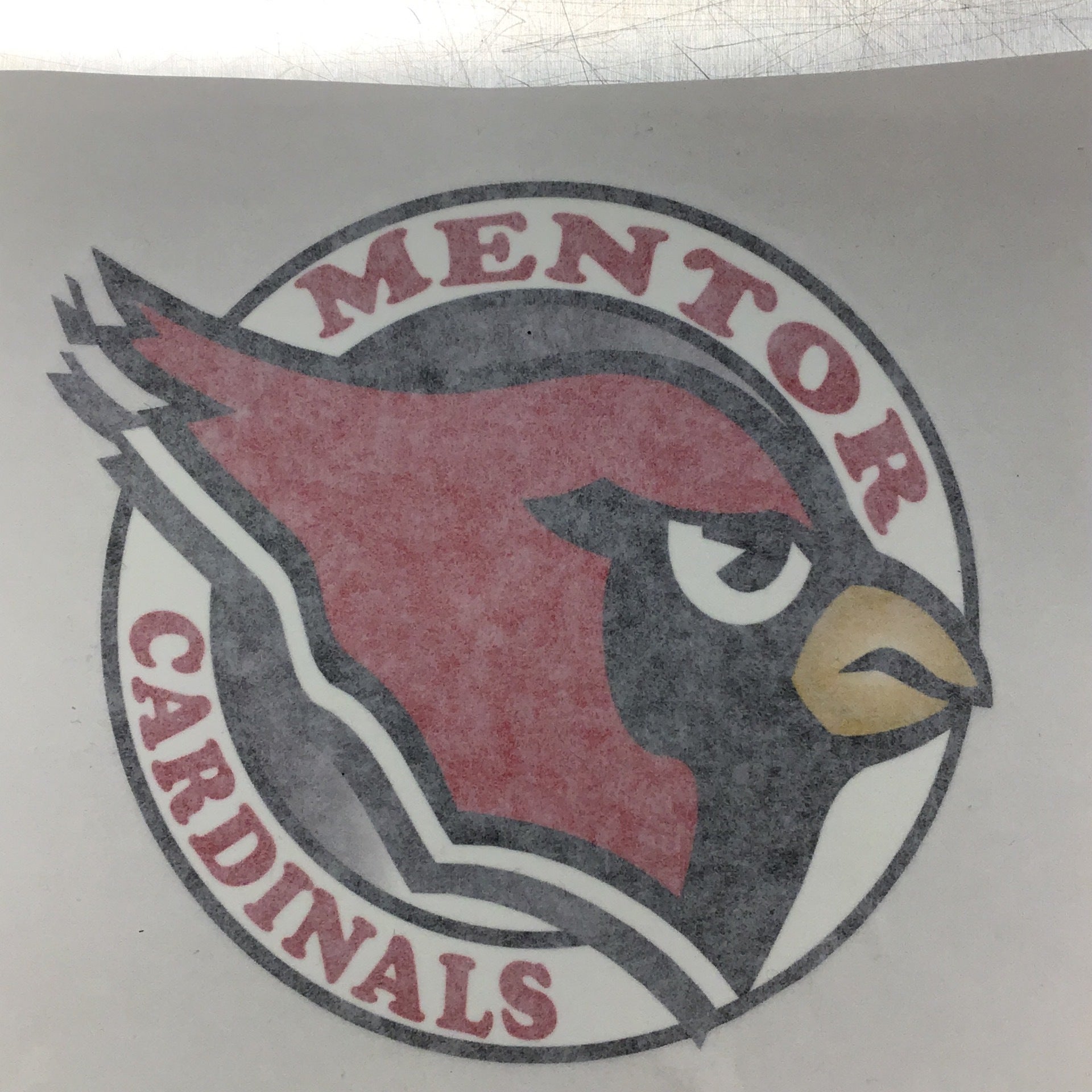 Mentor Cardinal Logo